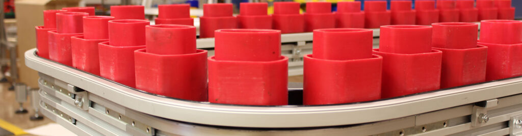 Product Manufacturing Puck Handling Conveyors | Simplimatic Automation